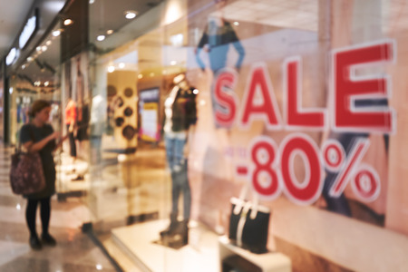 Blurred big sales on Black Friday. On sale at a clothing store in a ...