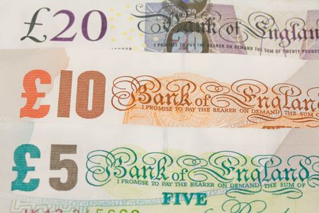 close up macro image of a five pound note,ten pound note and a twenty ...