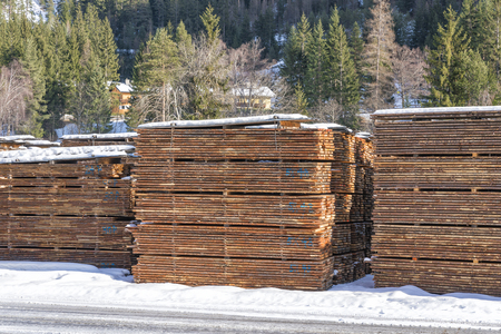 Drying timber boards at the sawmill in winter Alp Mountains - Stock ...
