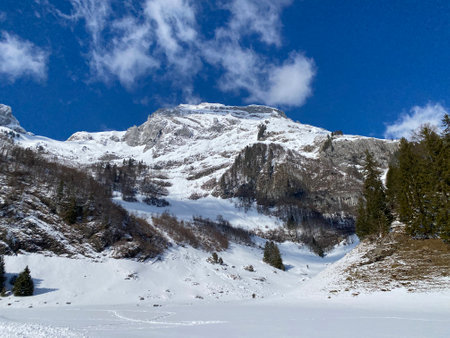 Snow-capped alpine peak Stoss (or Stooss, 2112 m) in Alpstein mountain ...
