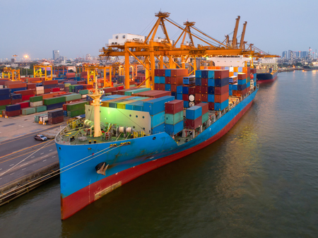 Containers yard in port congestion with ship vessels are loading and ...