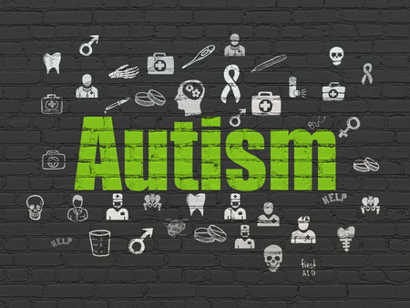 Medicine concept: Painted green text Autism on Black Brick wall ...