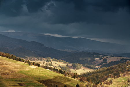 Spring rain in mountains. Thunder and clouds. - Stock Image - Everypixel