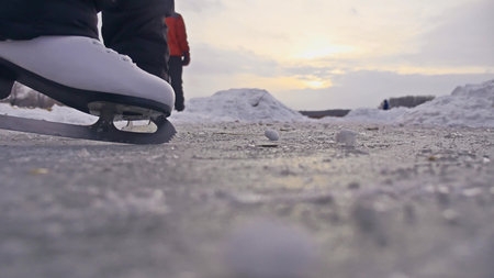 People skate on the skating rink in the winter on ice, active winter ...