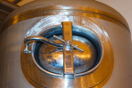 hatch on the tank made â â of stainless steel, food production - Stock ...
