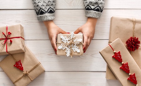 Creative hobby. Woman's hands show christmas holiday handmade present ...