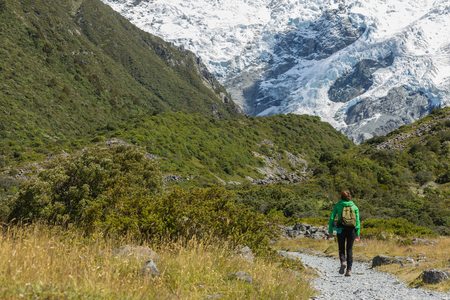 Woman Traveler with Backpack hiking in Mueller Hut Route, Mount Cook ...