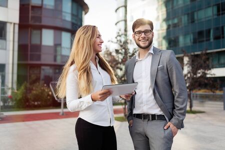 Business people commuting on street and talking - Stock Image - Everypixel