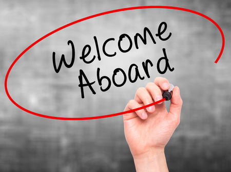 Man hand writing Welcome Aboard on visual screen. Business,help ...