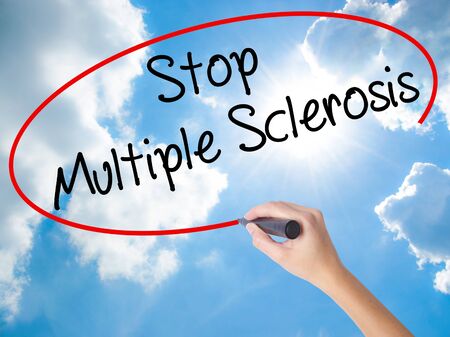 Woman Hand Writing Stop Multiple Sclerosis with black marker on visual ...