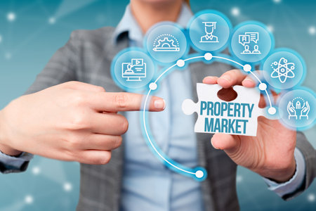 Sign displaying Property Market. Business idea the buying and selling ...
