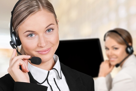 Female customer service representative smiling - Stock Image - Everypixel