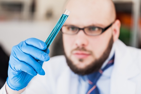 researcher working in a biotechnology lab / biochemical engineer ...