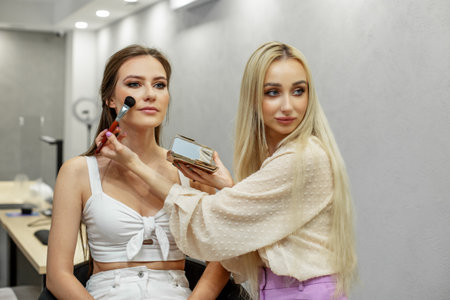 Makeup lesson at beauty school. Makeup master class. Makeup teacher and ...