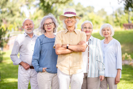 Group of happy elderly people bonding outdoors at the park - Old people ...