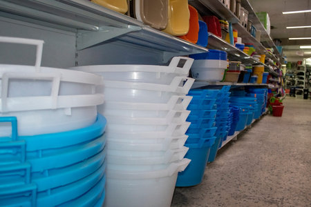 Aisle with household goods, plastic goods in a hardware store. A major ...