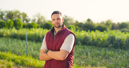 Portrait, sustainability and farmer man working outdoor on grass field ...