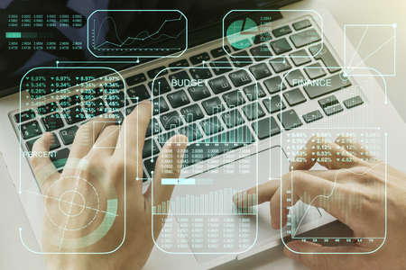 Multi exposure of creative statistics data hologram with hands typing ...