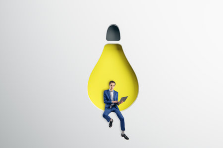 Abstract image of attractive young european businessman sitting on ...
