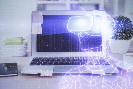 Computer on desktop with AR theme icon. Multi exposure. Concept of ...