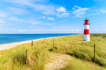 Ellenbogen lighthouse on sand dune and beach view on northern coast of ...