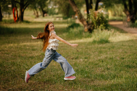 Joyful Child Running Freely in Natureの写真素材 [40248861008]｜毎月1点無料（フリー）の ...