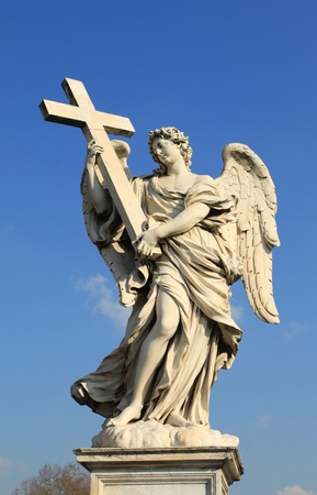 Famous Ponte Sant' Angelo bridge. Baroque angel sculpture by Ercole ...