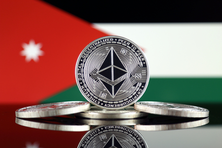 Physical version of Ethereum (ETH) and Jordan Flag. Conceptual image ...