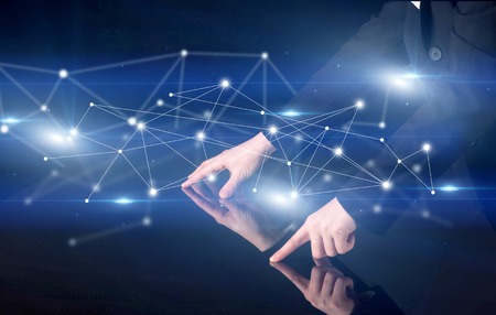 Hands touching interactive table - Stock Image - Everypixel