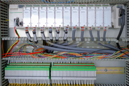 Wiring PLC Control panel with wires industrial factory.Wiring terminals ...