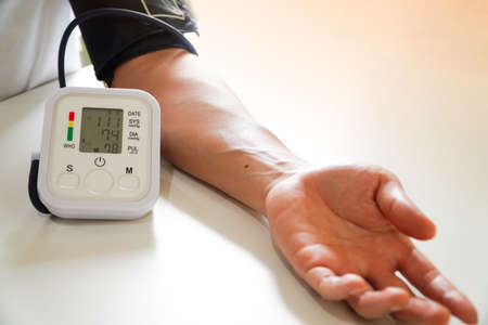 Middle-aged male patients with bp, heart rate, digital pulse monitoring ...