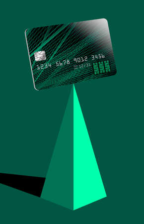 A generic mock credit card or debit card is seen balanced on the ...