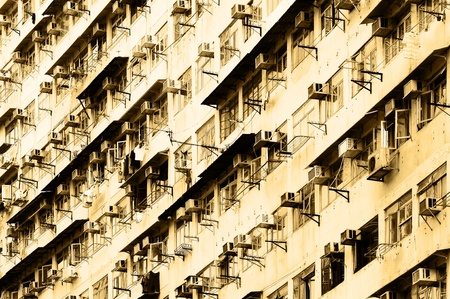 Big tenement-house wall in the Hong Kong. Sepia tint.の写真素材 [40011646493 ...