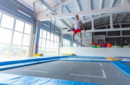 Fitness, fun, leisure and sport activity concept - Handsome happy man ...