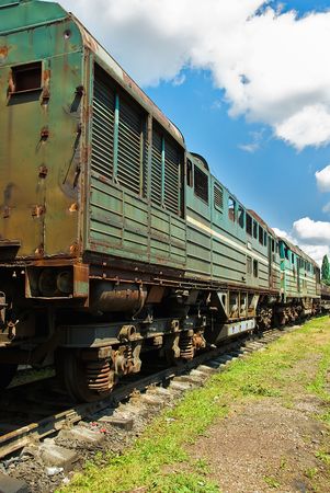 unserviceable trains on rails under blue skyの写真素材 [40005305455] - イメージマート