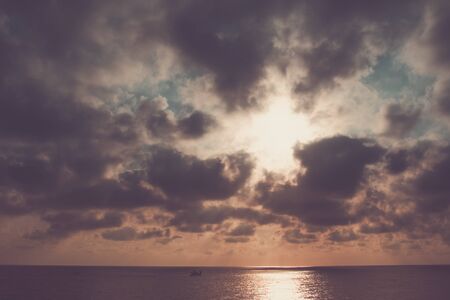 Evening pre-sunset dramatic seascape with beautiful clouds in the sky ...