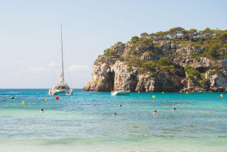 Promontory of the coastline and turquoise blue sea of one little cove ...