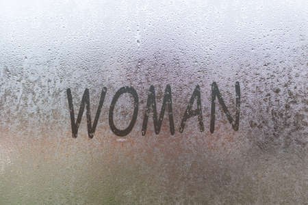 Word woman. Abstract background with drops of water. Inscription on ...