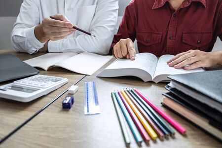 Teaching helping and study course, Team of young teacher or tutor helps ...