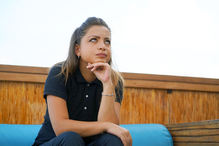 A lonely sad woman, she is depressed and separated from problems in her ...