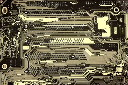 Close-up of back side circuit board pattern with pins in rows. Filtered ...