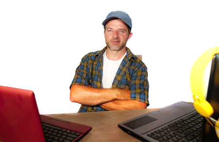 young happy and attractive millennial business man working with laptop ...