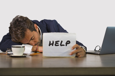 young attractive sad and depressed business man working at office ...