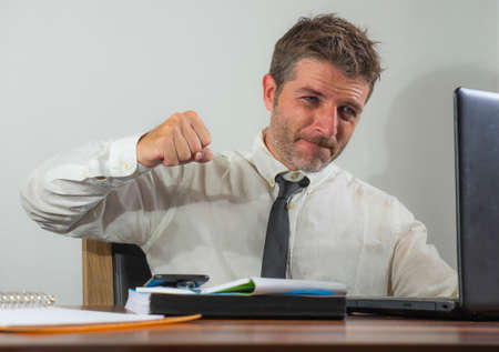 upset and angry businessman at computer desk in office- unhappy man ...