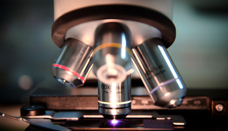 close up shot of microscope at the laboratory take with drak tone ...