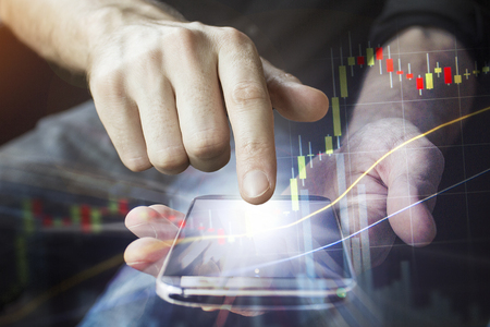 Mobile device in hands for business connected globally online through ...