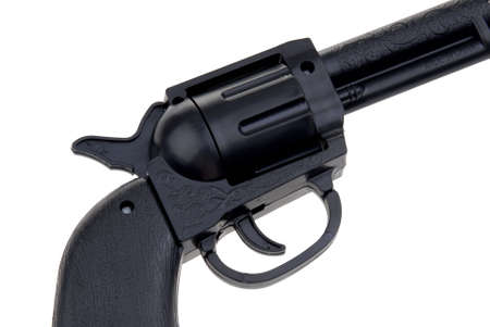 detail of a plastic toy western revolver isolated over whiteの写真素材 ...