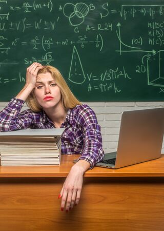 Negative facial expression. Tired student learning at home. Young ...