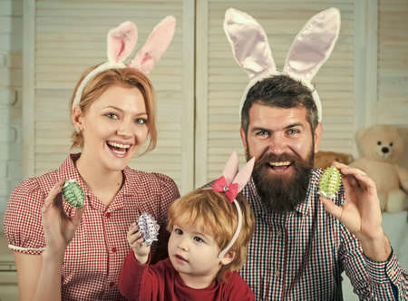 Happy easter family paint eggs. Family values, childhood, art. Happy ...