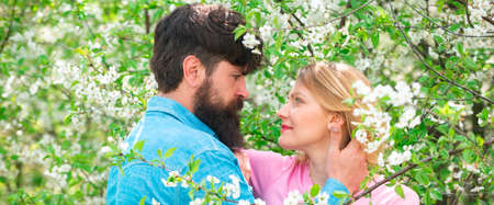 Spring couple in love, banner. Couple walking in the spring Park and ...